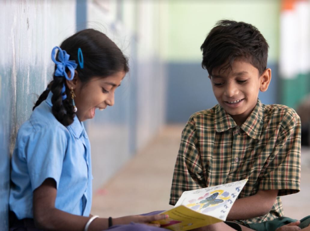 Indian Kid Reading A Book